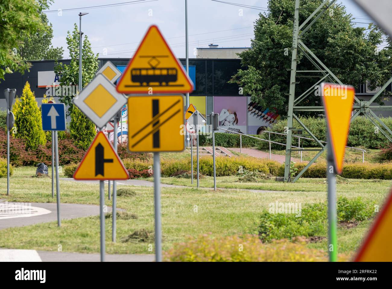 Street with road Signs and Traffic Symbols in Poland. Bicycle square ...