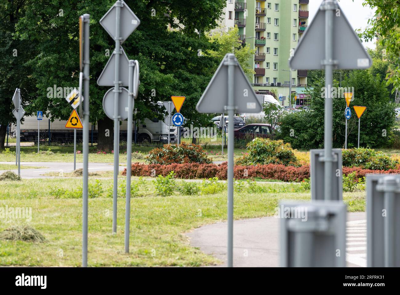 Street with road Signs and Traffic Symbols in Poland. Bicycle square ...