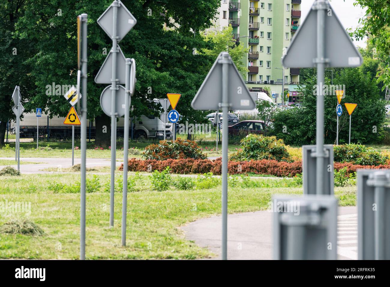 Street with road Signs and Traffic Symbols in Poland. Bicycle square ...