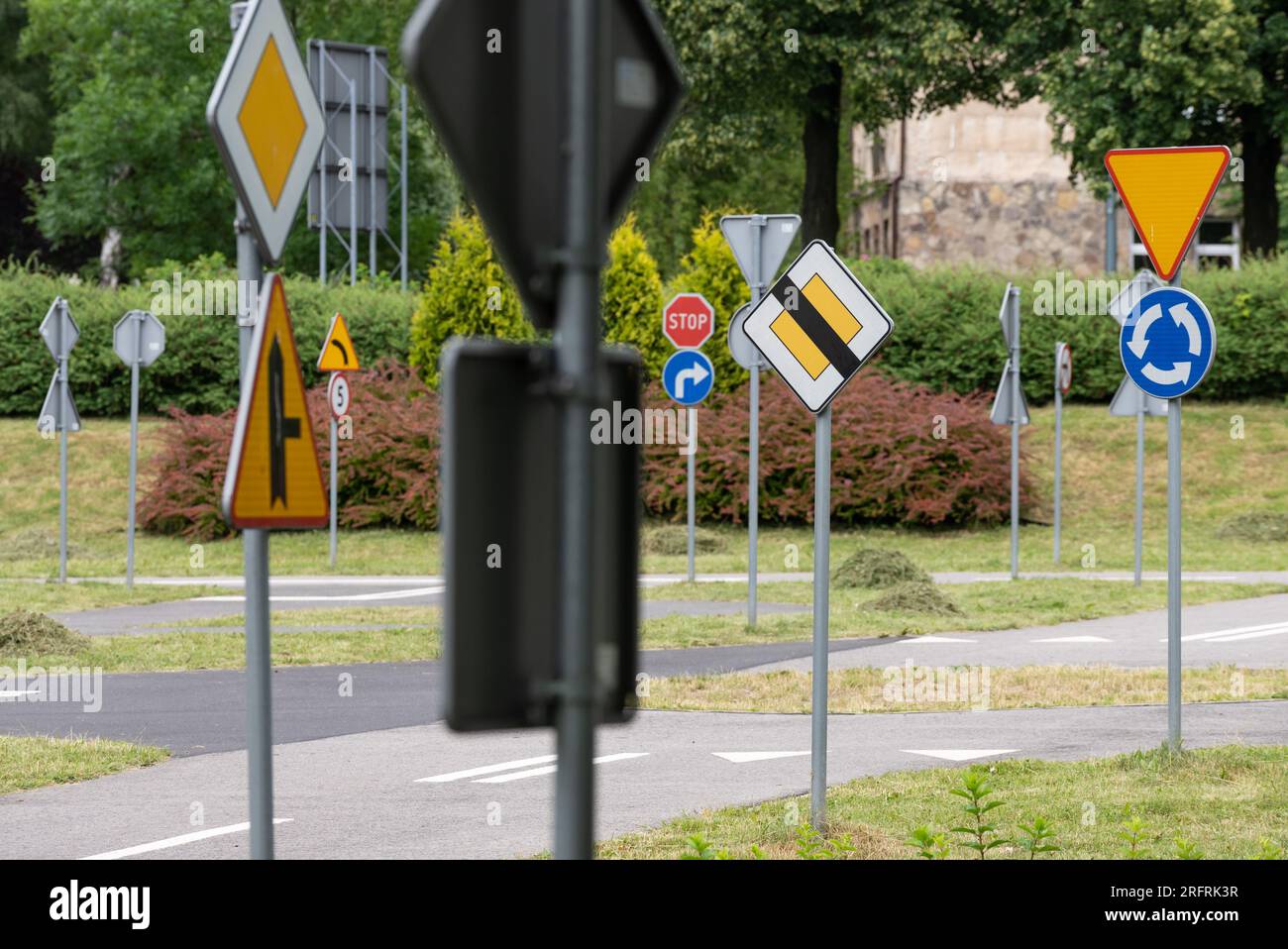 Street with road Signs and Traffic Symbols in Poland. Bicycle square ...