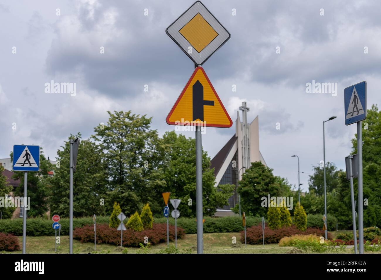 Street with road Signs and Traffic Symbols in Poland. Bicycle square ...