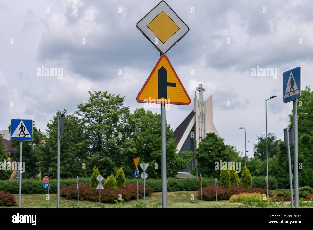 Street with road Signs and Traffic Symbols in Poland. Bicycle square ...