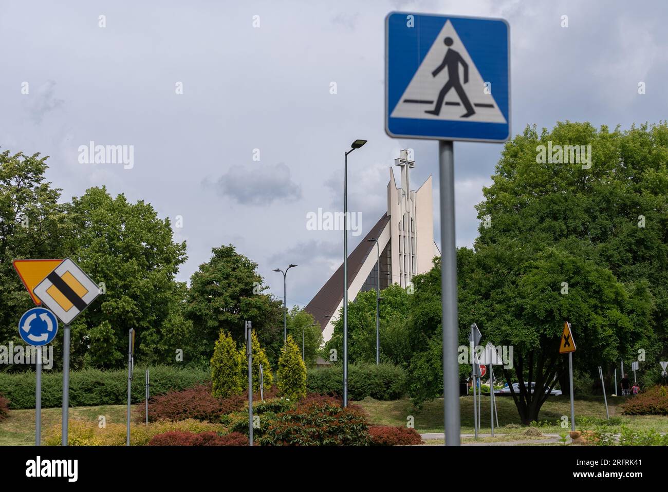 Street with road Signs and Traffic Symbols in Poland. Bicycle square ...