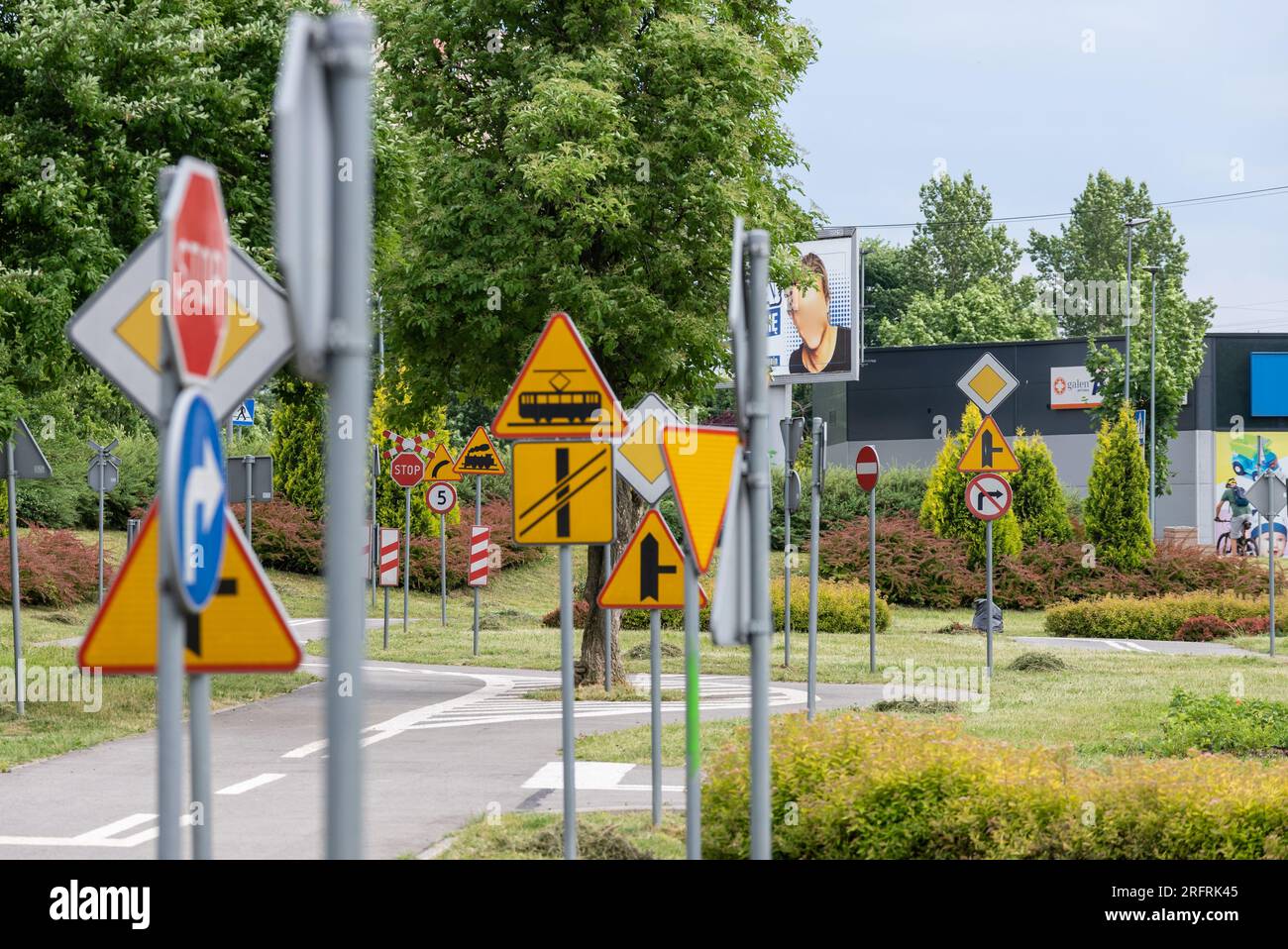 Street with road Signs and Traffic Symbols in Poland. Bicycle square ...