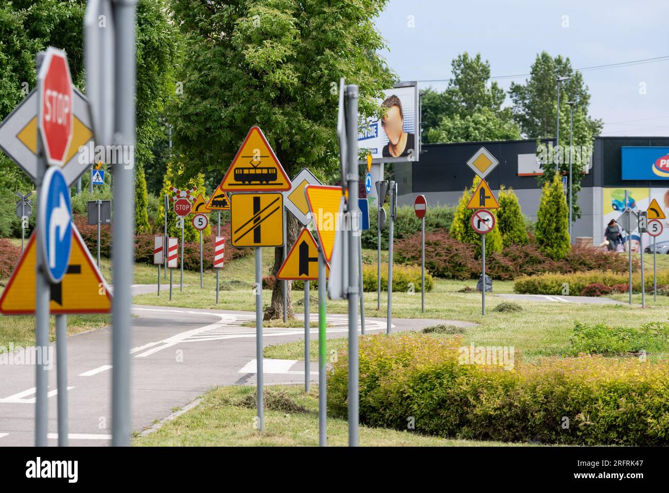 Street with road Signs and Traffic Symbols in Poland. Bicycle square ...