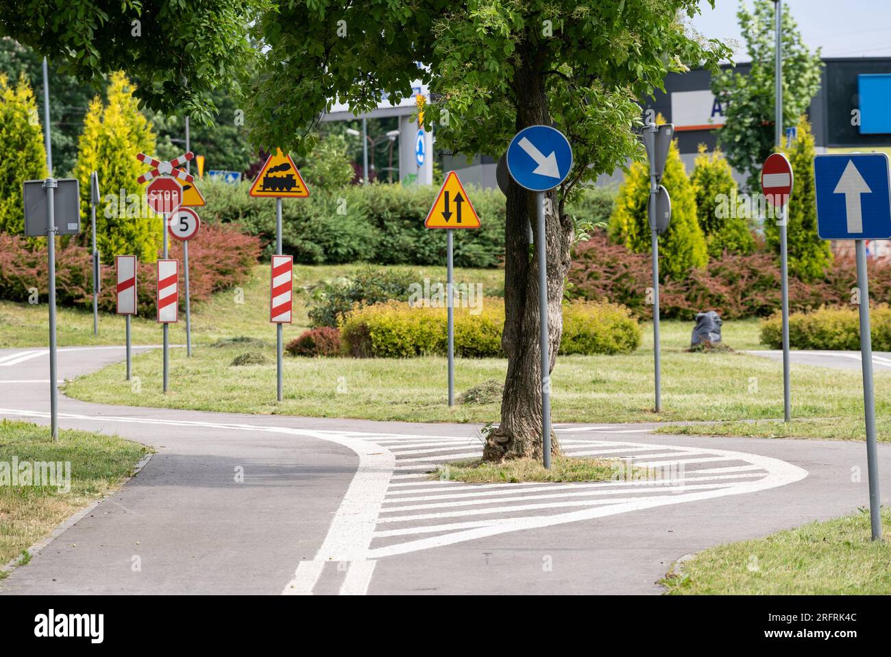 Street with road Signs and Traffic Symbols in Poland. Bicycle square ...