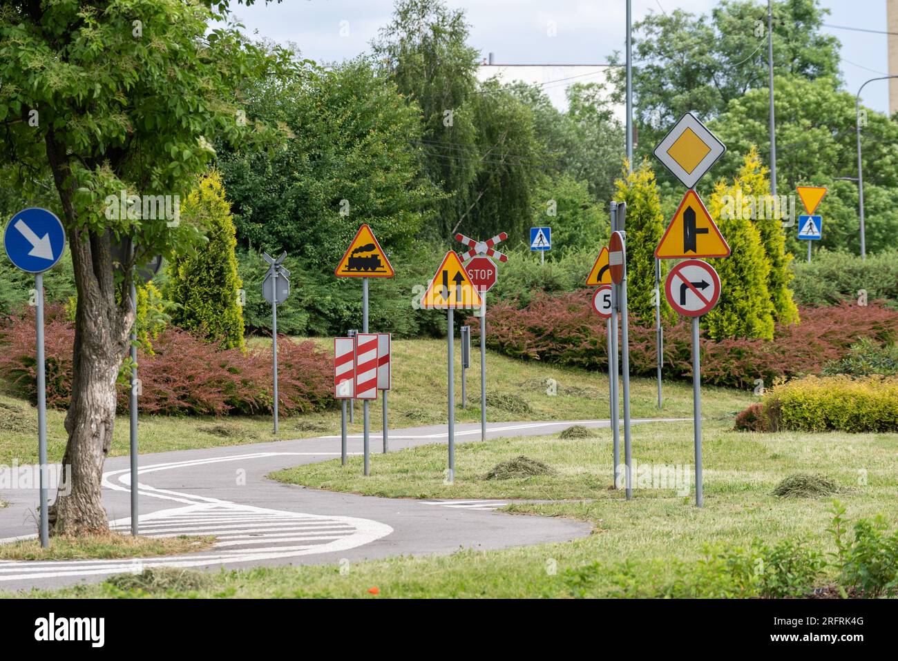 Street with road Signs and Traffic Symbols in Poland. Bicycle square ...