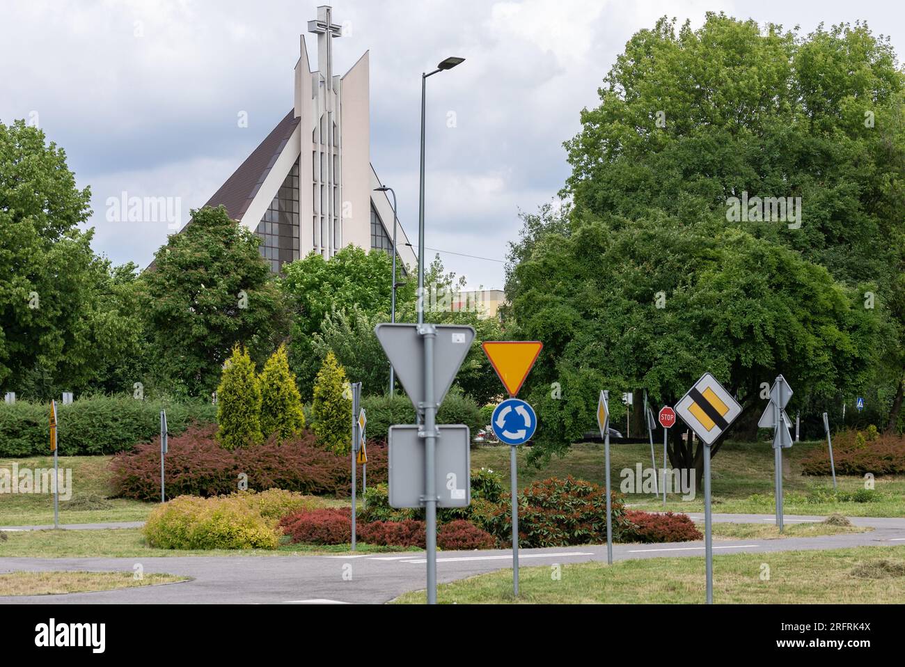 Street with road Signs and Traffic Symbols in Poland. Bicycle square ...