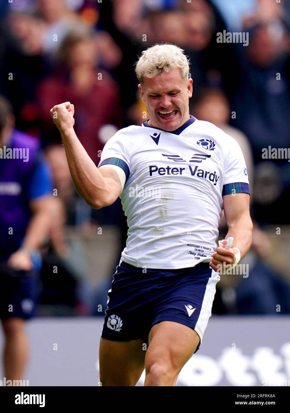 Scotland's Darcy Graham celebrates scoring their side's first try ...