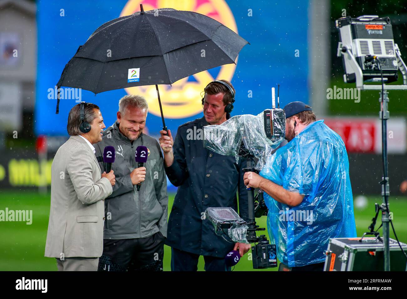 Interview under umbrella hi-res stock photography and images - Alamy