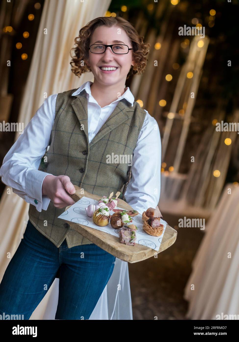 Waitress stylish modern waistcoat jeans hi-res stock photography and ...