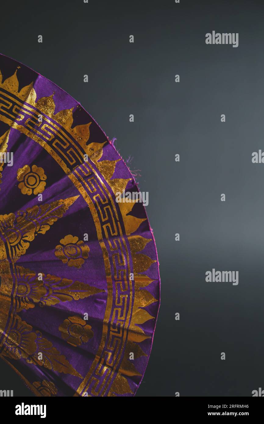 texture of Traditional Balinese hand fan patterned prada isolated on ...