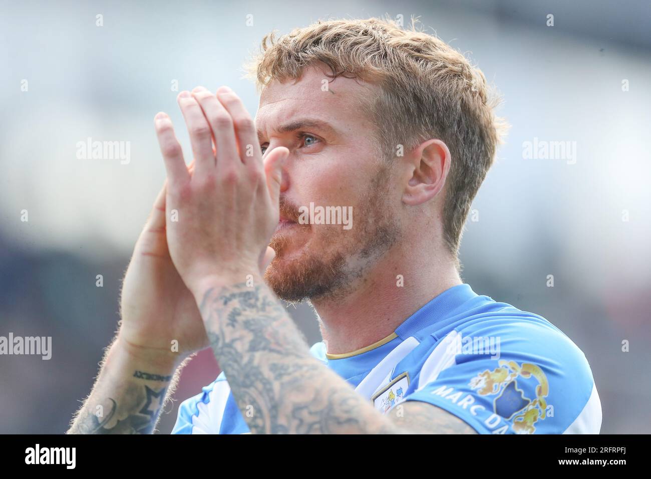 Danny Ward #25 of Huddersfield Town applauds the travelling fans after ...