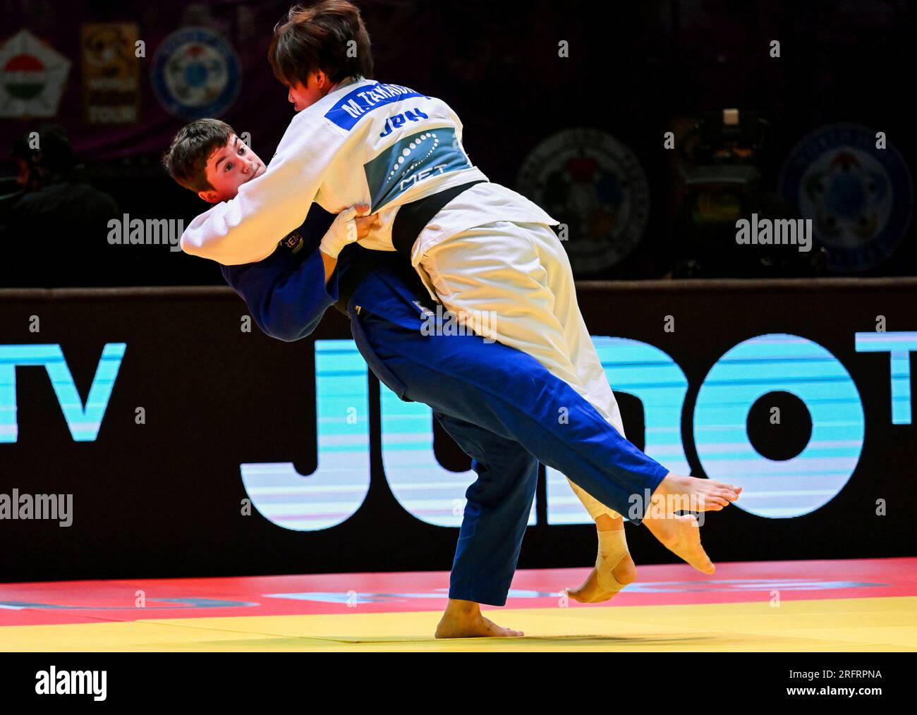 Miku Takaichi, in white, of Japan and Laura Fazliu of Kosovo fight in ...