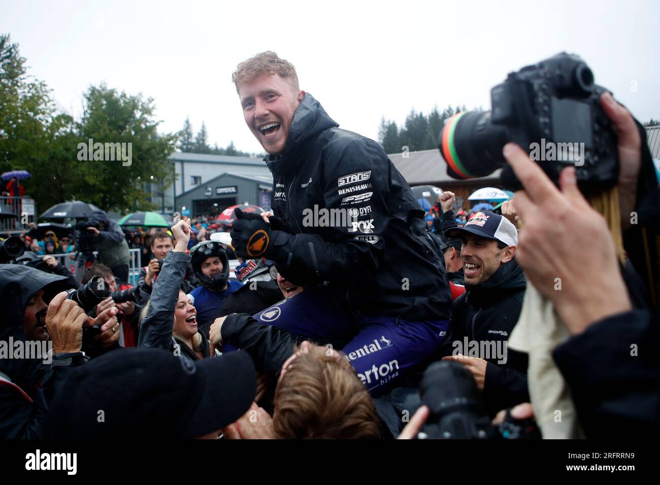 Great Britain's Charlie Hatton celebrates winning downhill mountain ...