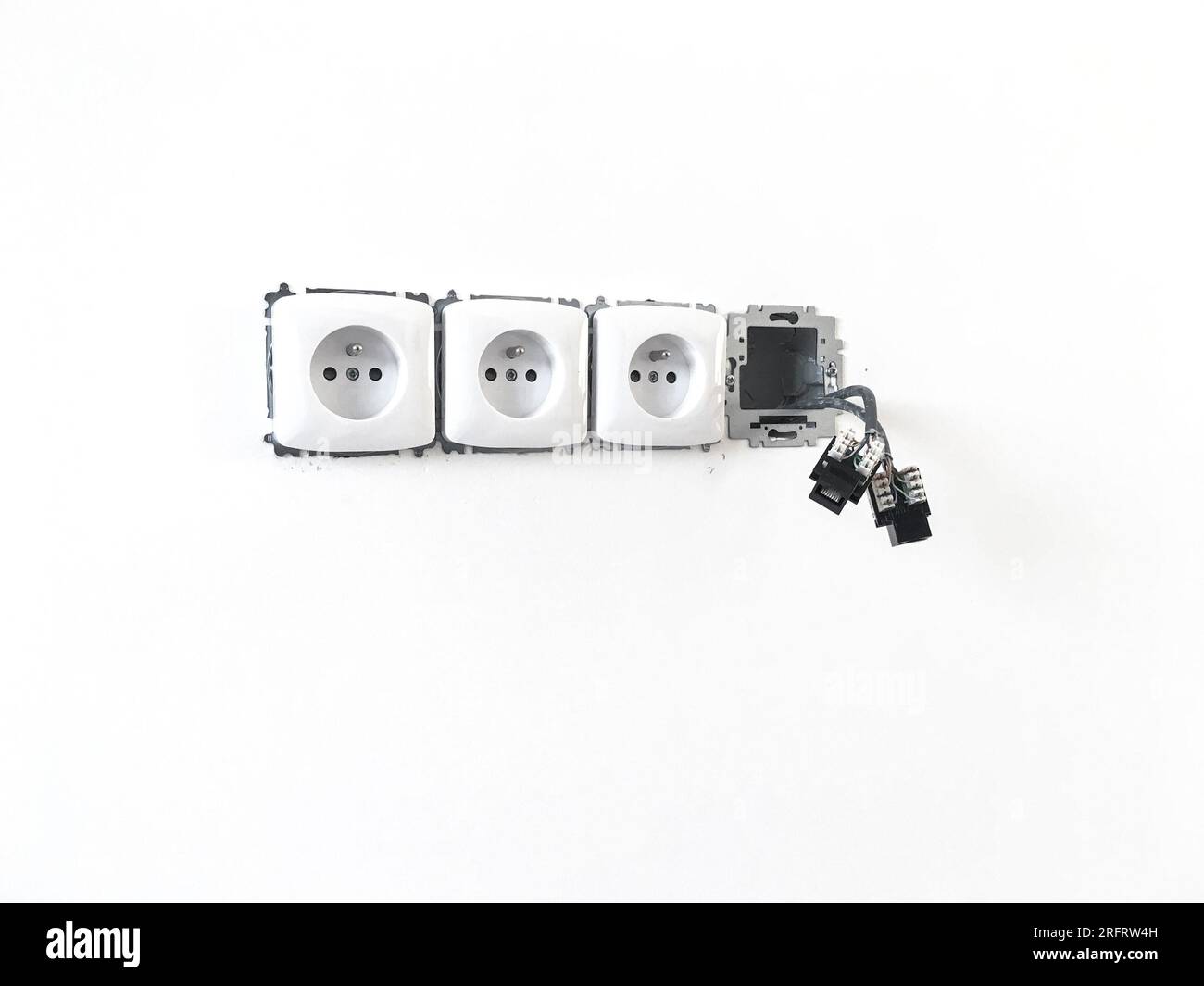 Multiple electrical plugs in wall hi-res stock photography and images ...