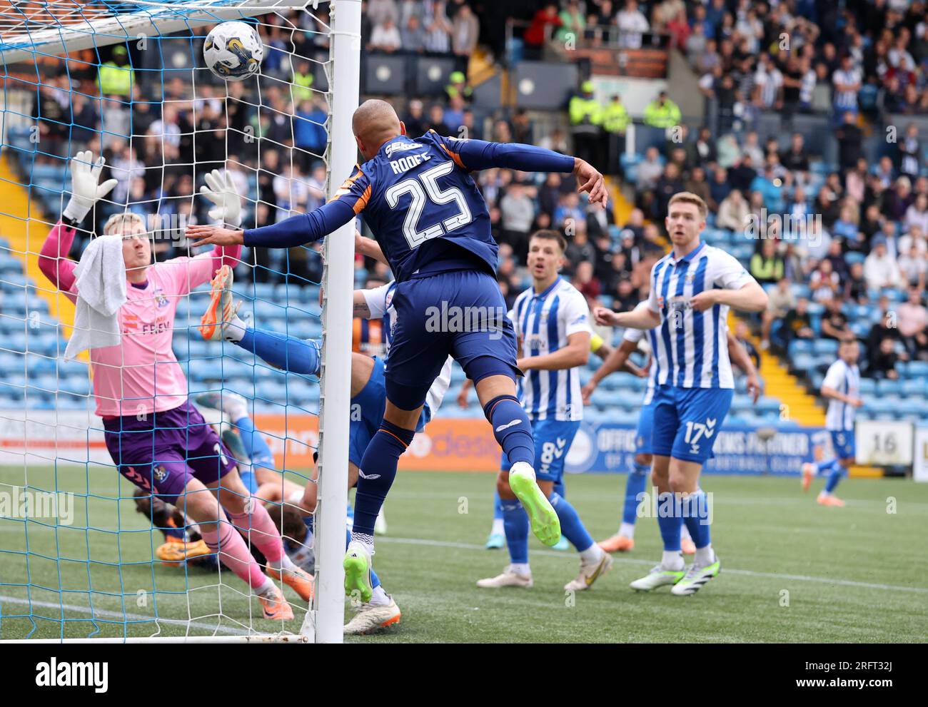 Rangers' Kemar Roofe (centre) with a attempt at goal during the cinch ...