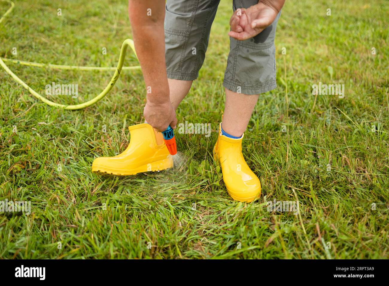 Rubber boots tool mud hi-res stock photography and images - Alamy