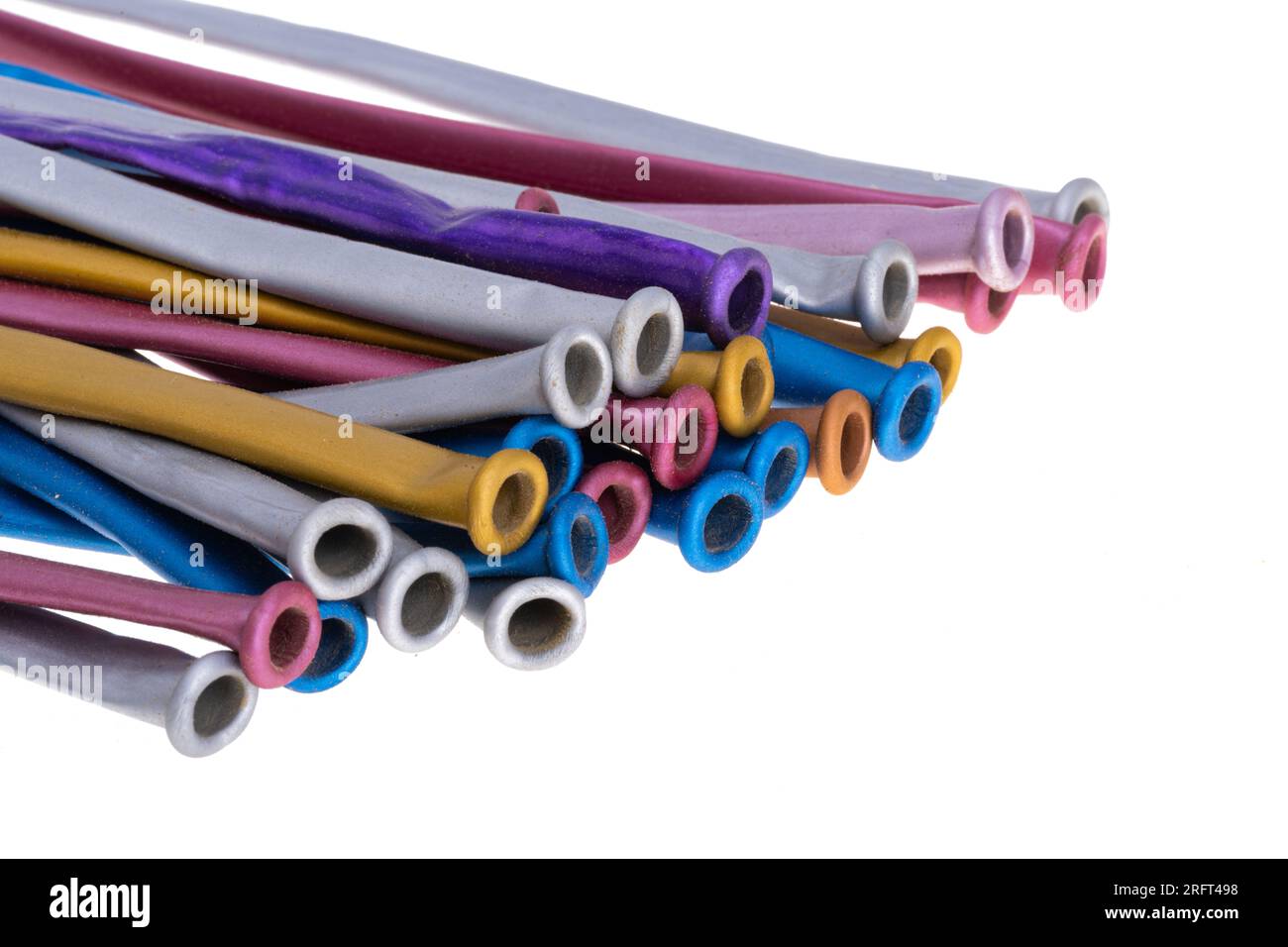 colored long balloons isolated on white background Stock Photo - Alamy