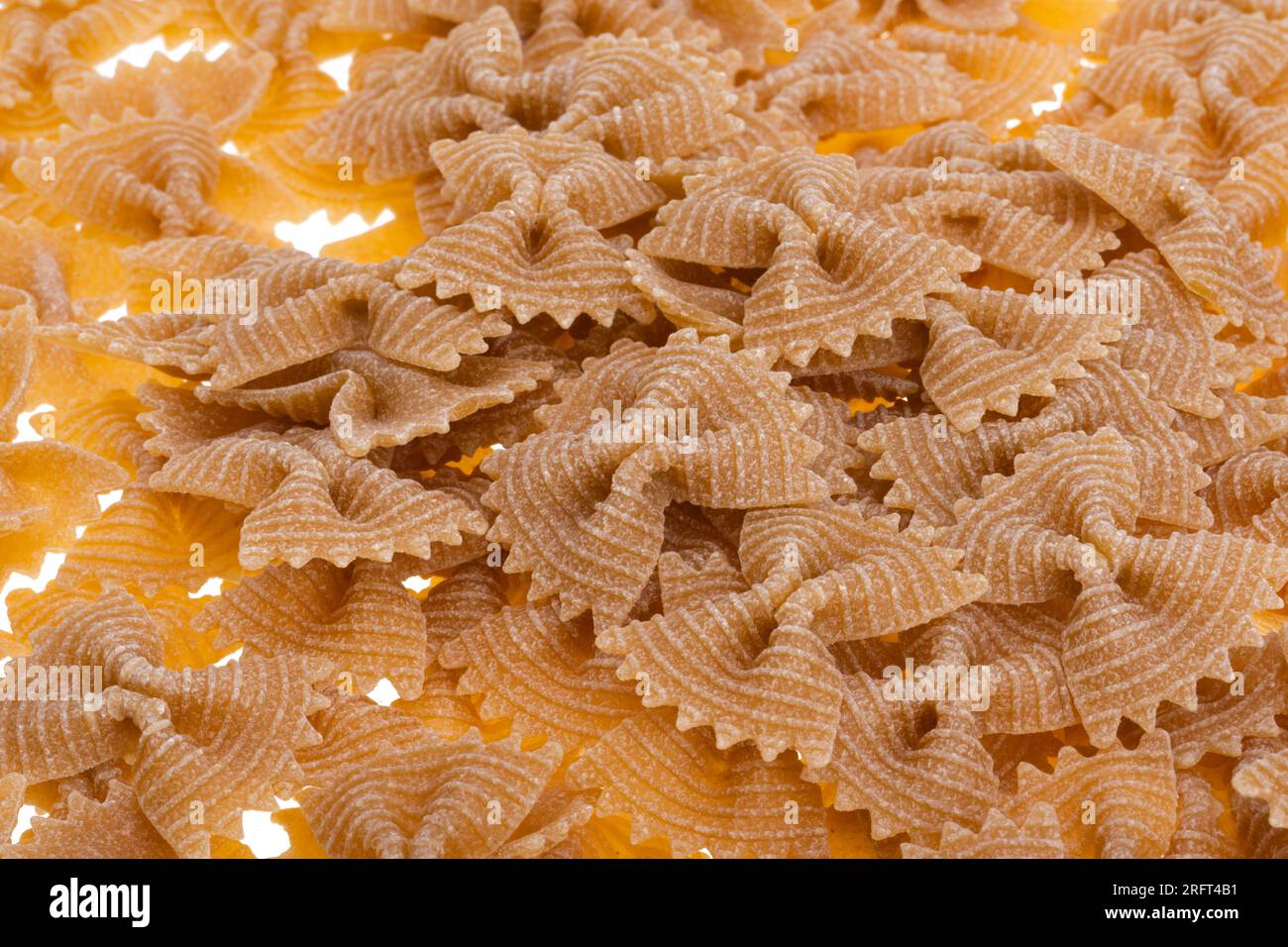 pasta bows isolated on white background Stock Photo - Alamy