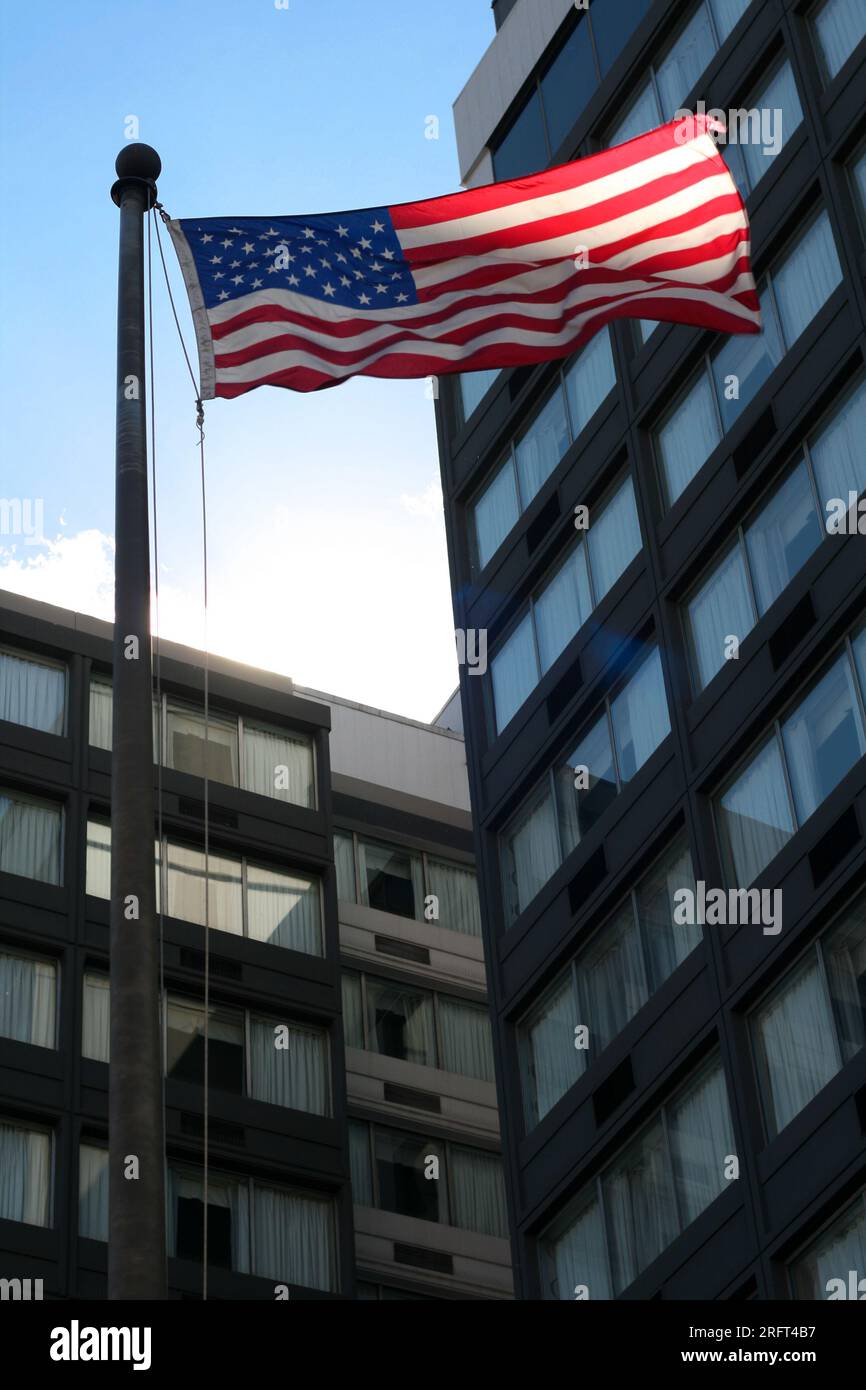 American flag rippling in wind outside hotel in Toronto Canada Stock ...