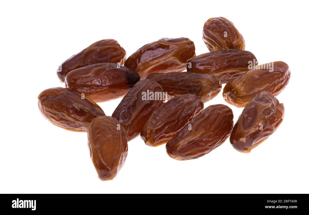 dried dates isolated on white background Stock Photo - Alamy