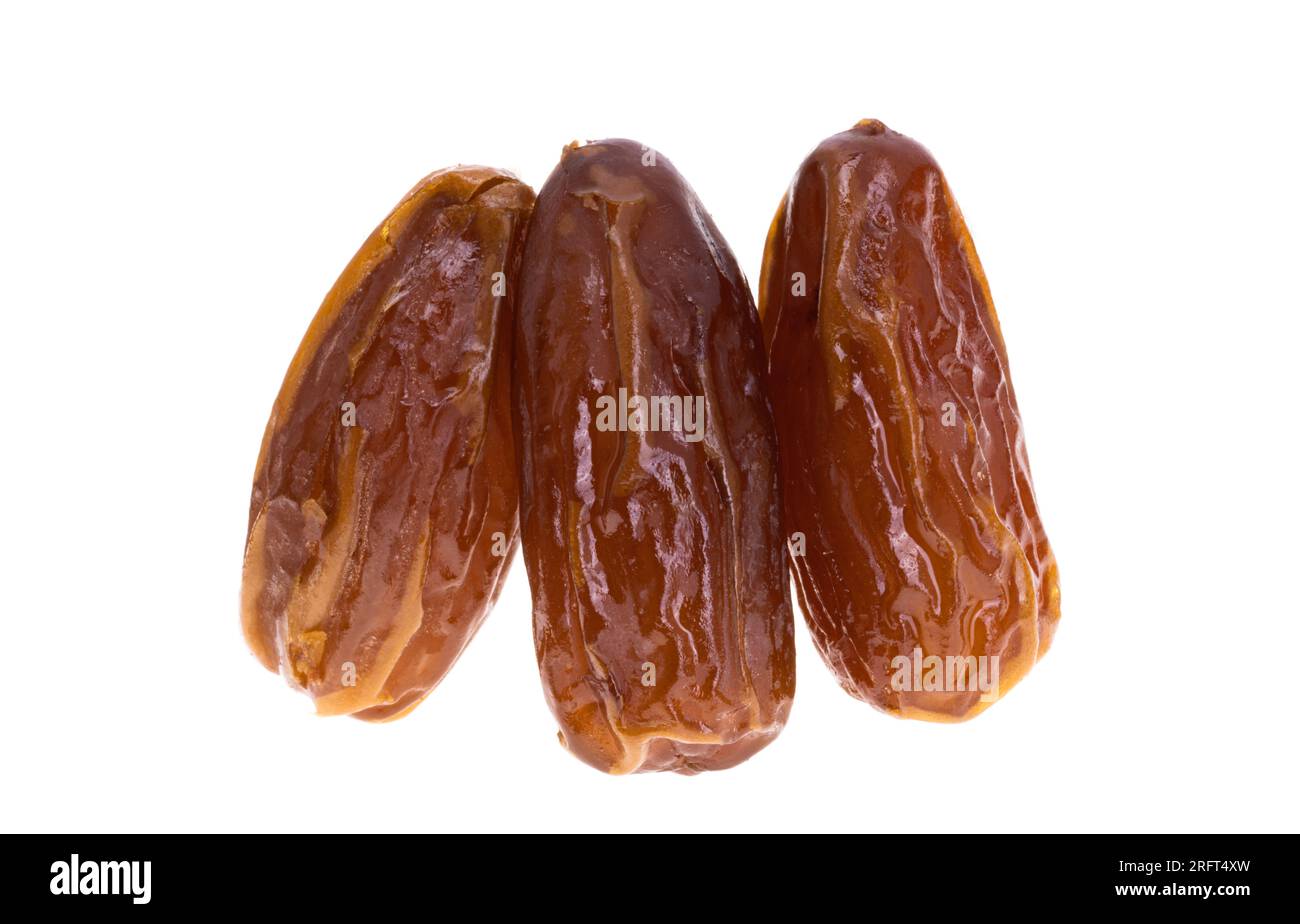 dried dates isolated on white background Stock Photo - Alamy