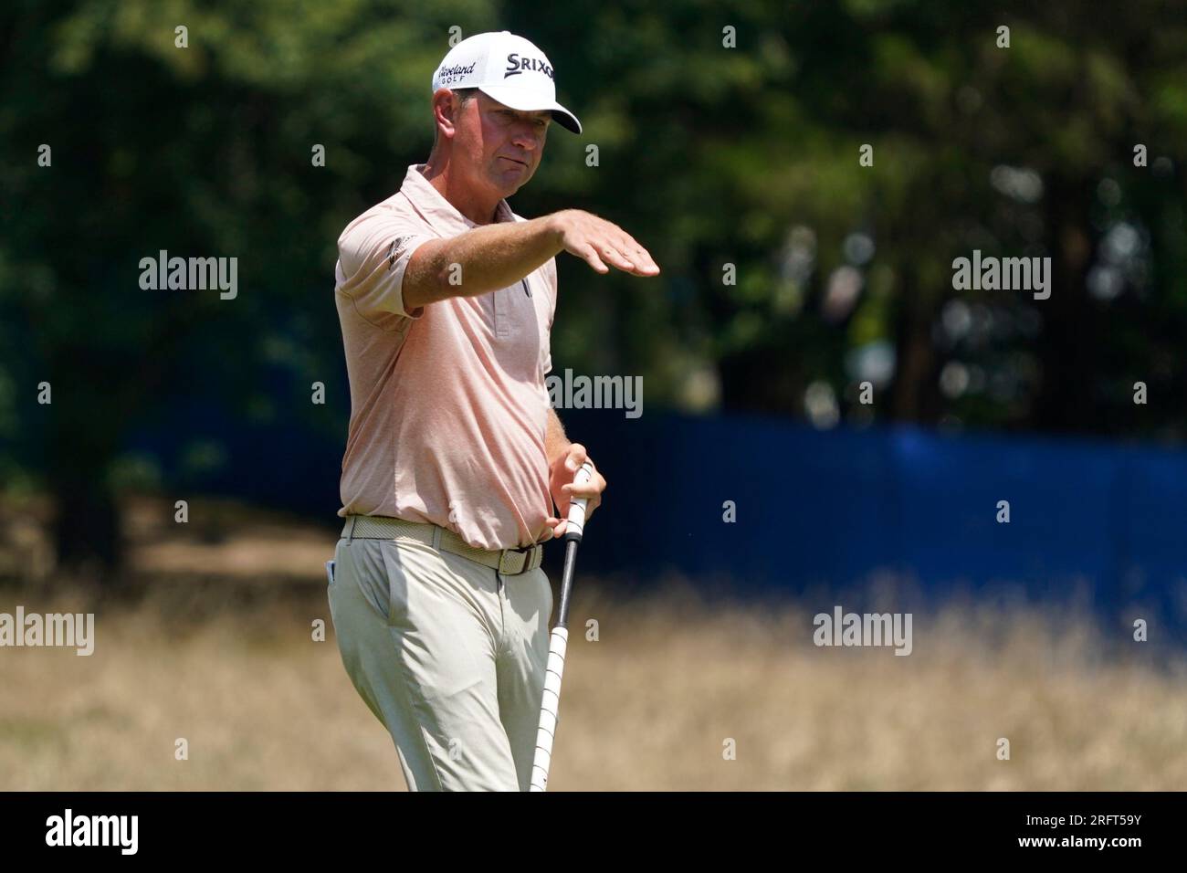 Lucas Glover reacts to his putt on the first hole during the third ...