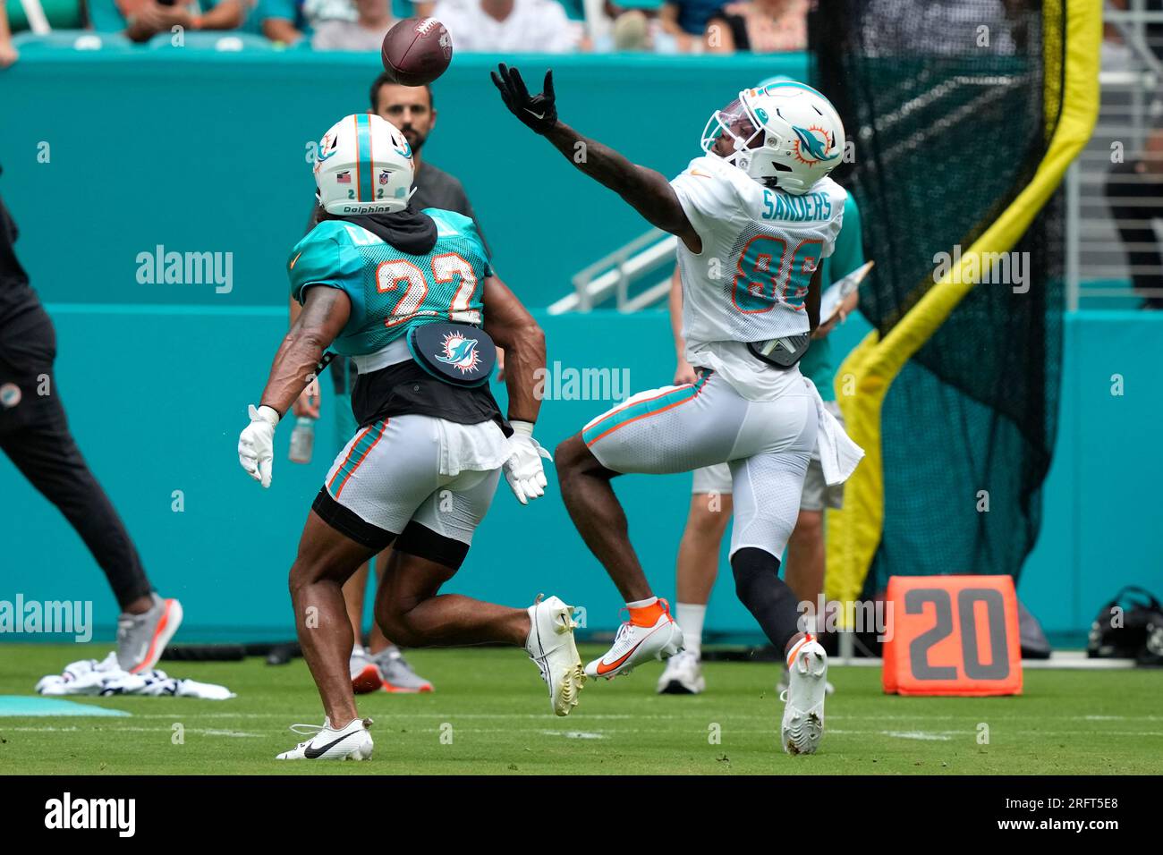 Miami Dolphins safety Elijah Campbell (22) defends against wide ...