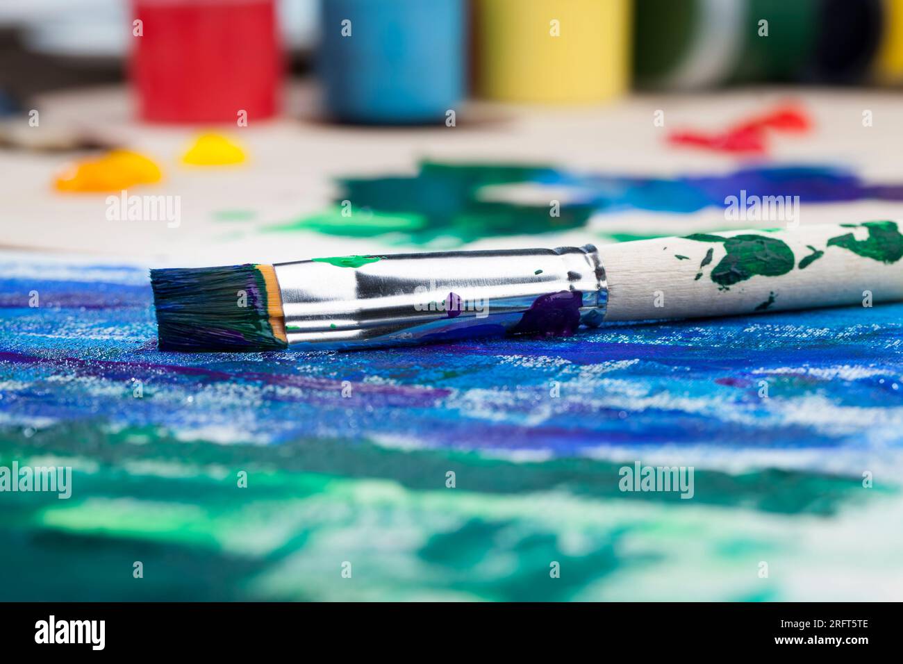 a person's creative process of drawing by mixing different colors of ...
