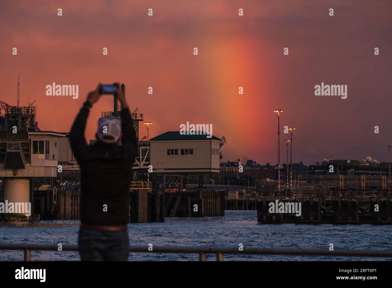 Seattle, USA. 4th Aug, 2023. A rainbow sunset on the waterfront Stock ...