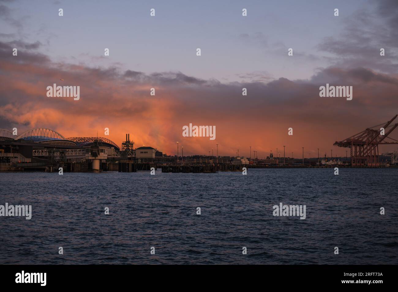 Seattle, USA. 4th Aug, 2023. A rainbow sunset on the waterfront Stock ...