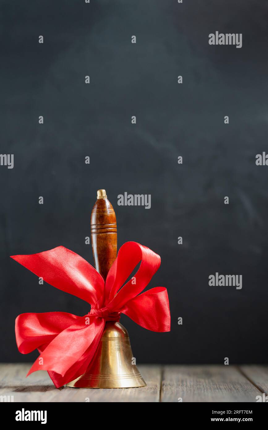 back to school background. beginning of school year. hand bell on first ...