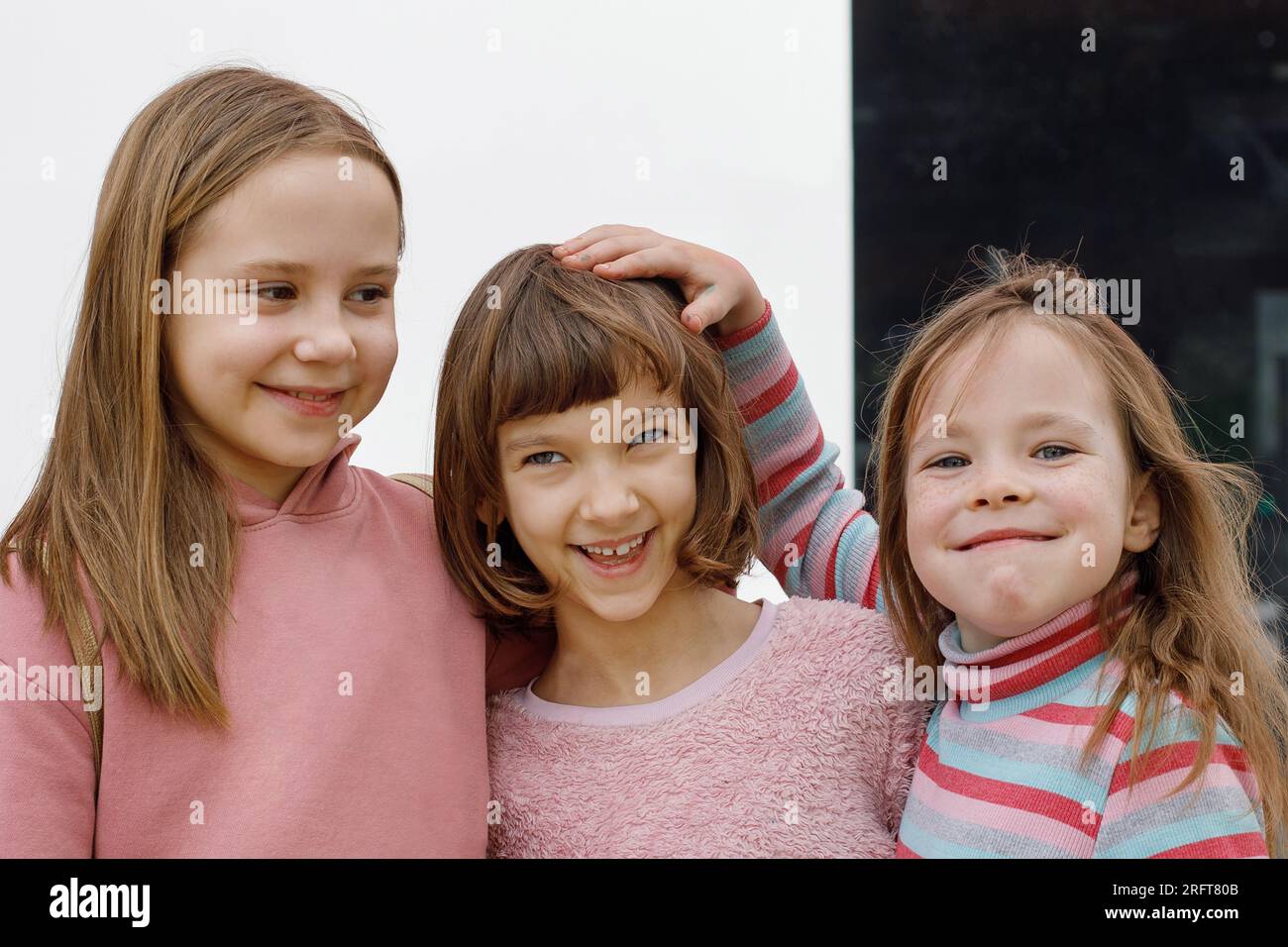 Kids hugging hi-res stock photography and images - Alamy