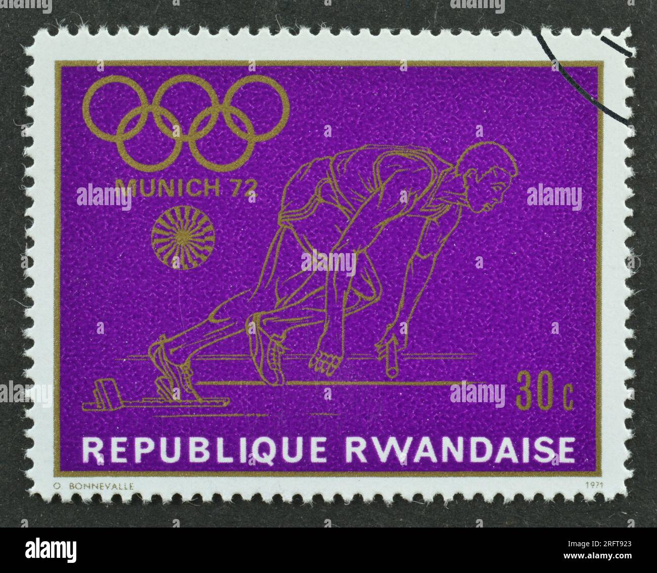 Cancelled postage stamp printed by Rwanda, that shows Racer, promoting ...