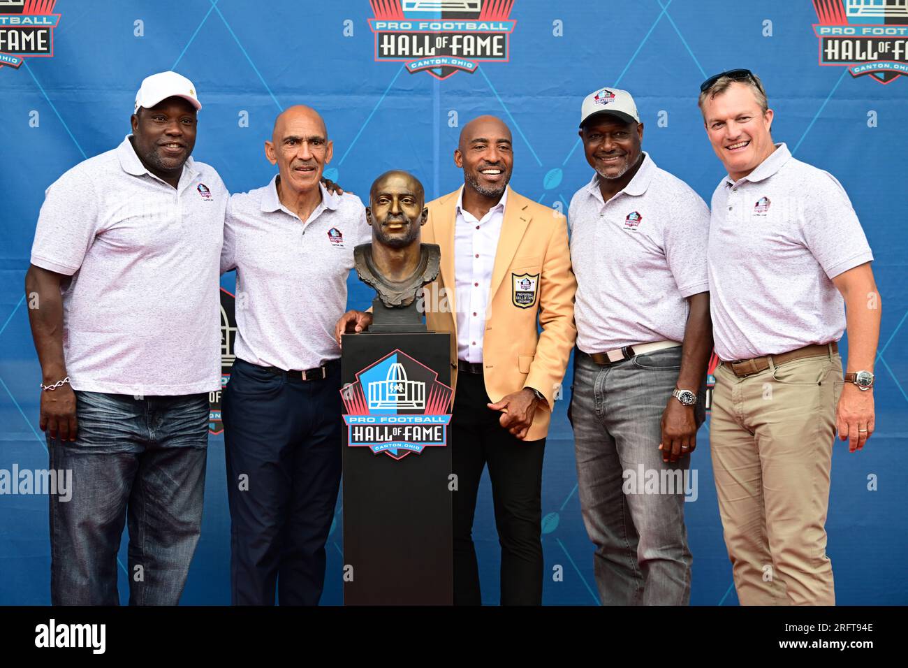 Former NFL player Ronde Barber, third from right, poses with his former ...