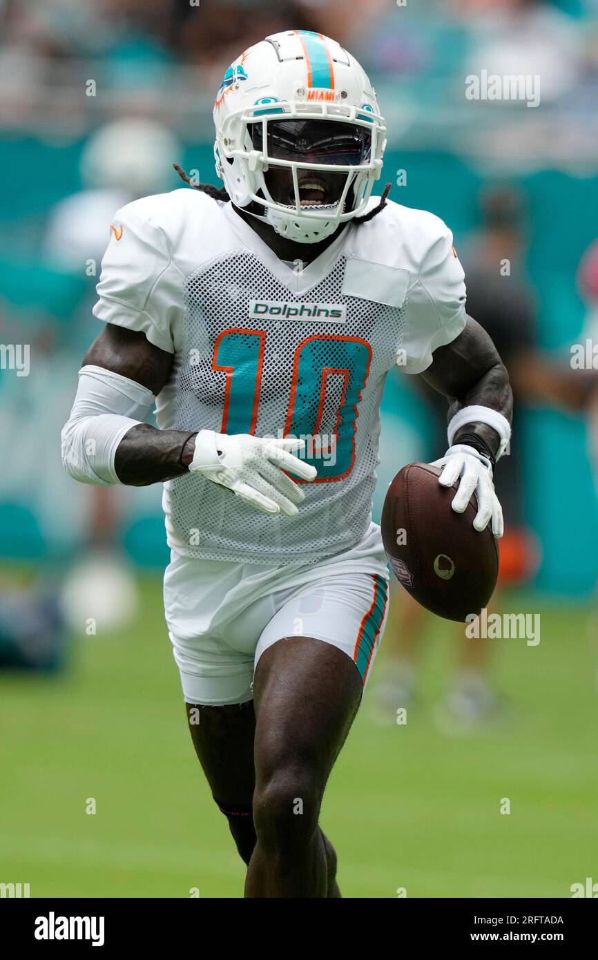 Miami Dolphins wide receiver Tyreek Hill (10) runs drills during a team ...