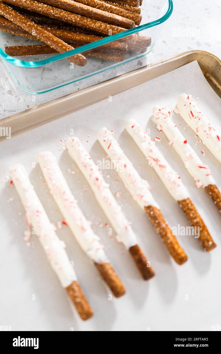 Candy cane chocolate covered pretzel rods Stock Photo - Alamy