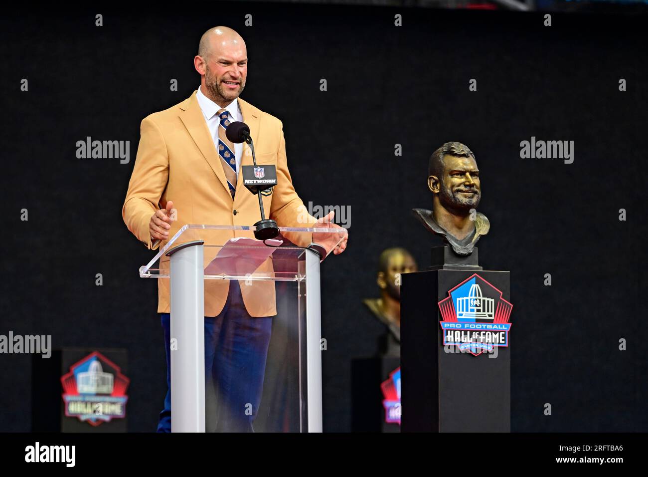 Former NFL player Joe Thomas speaks during his induction into the Pro ...