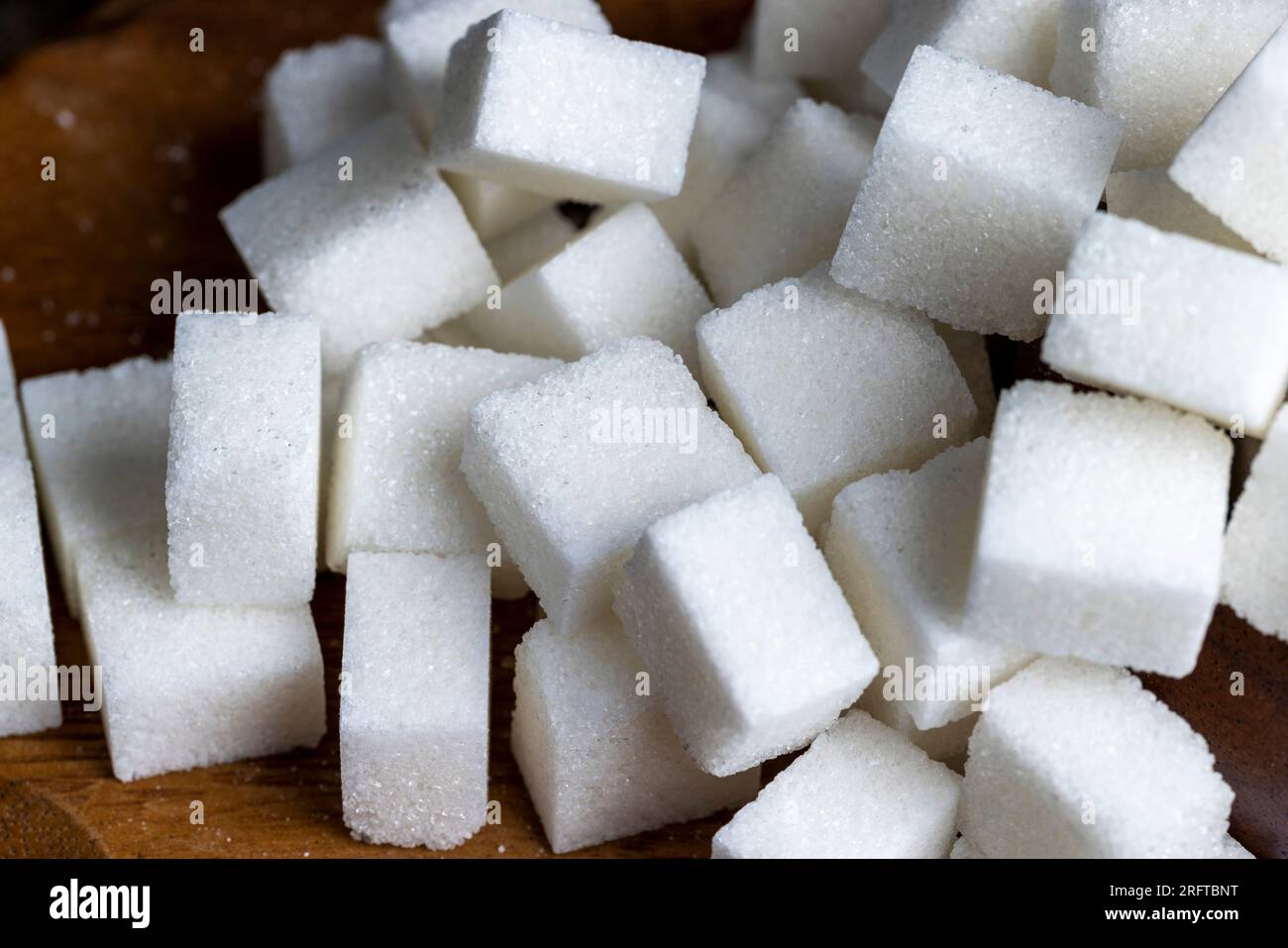 Refined white beet sugar, cubes of white sweet sugar from sugar beet ...