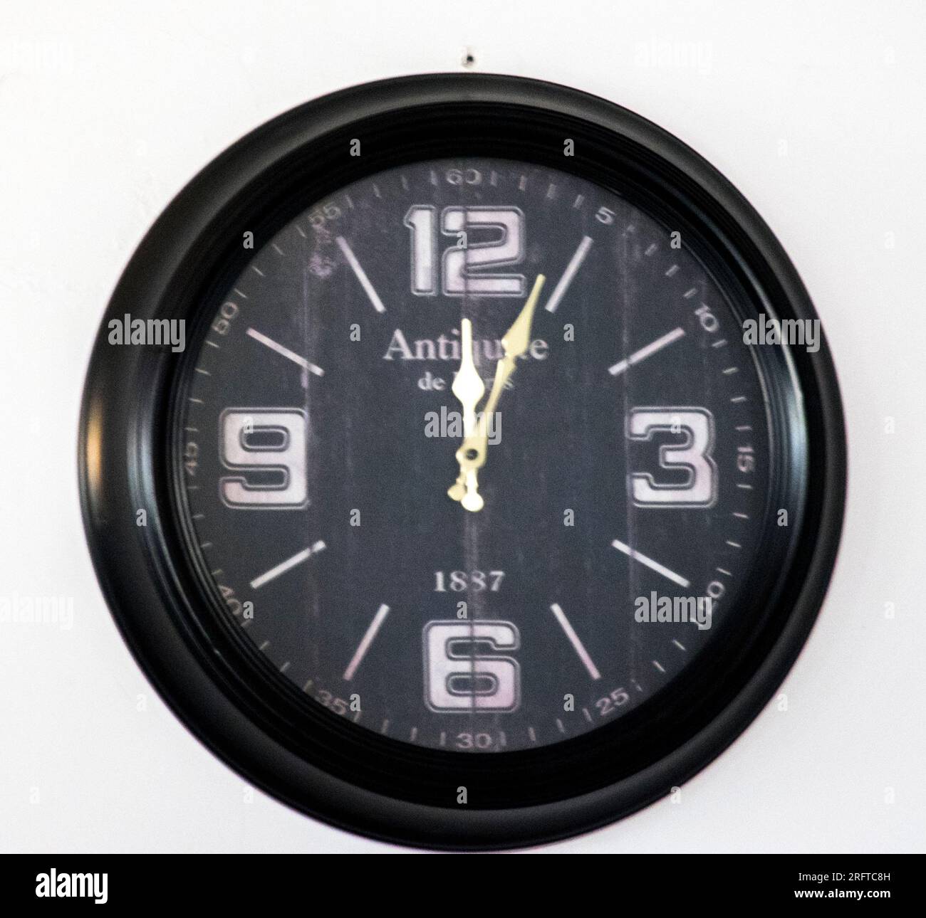 Black and White Vintage Wall Clock Stock Photo - Alamy