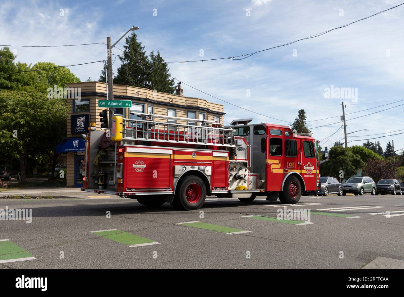 A fire engine from Fire Station 29 responds to an emergency along SW ...