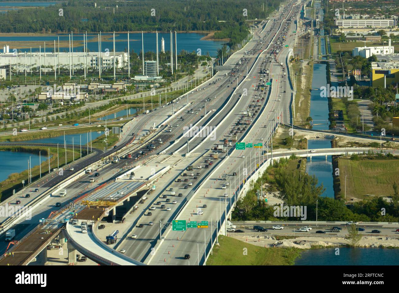 Aerial view of busy american freeway road interchange under ...