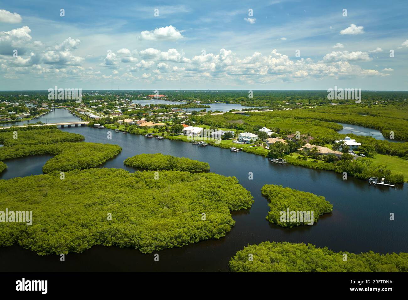 Aerial view of rural private houses in remote suburbs located near ...