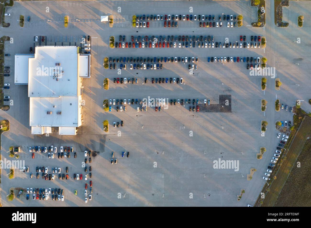 Large parking lot of local dealer with many brand new cars parked for ...