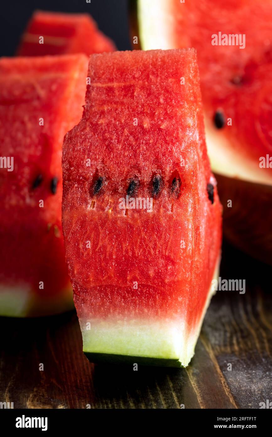 Sliced red and ripe watermelon on the table, juicy pieces of watermelon ...