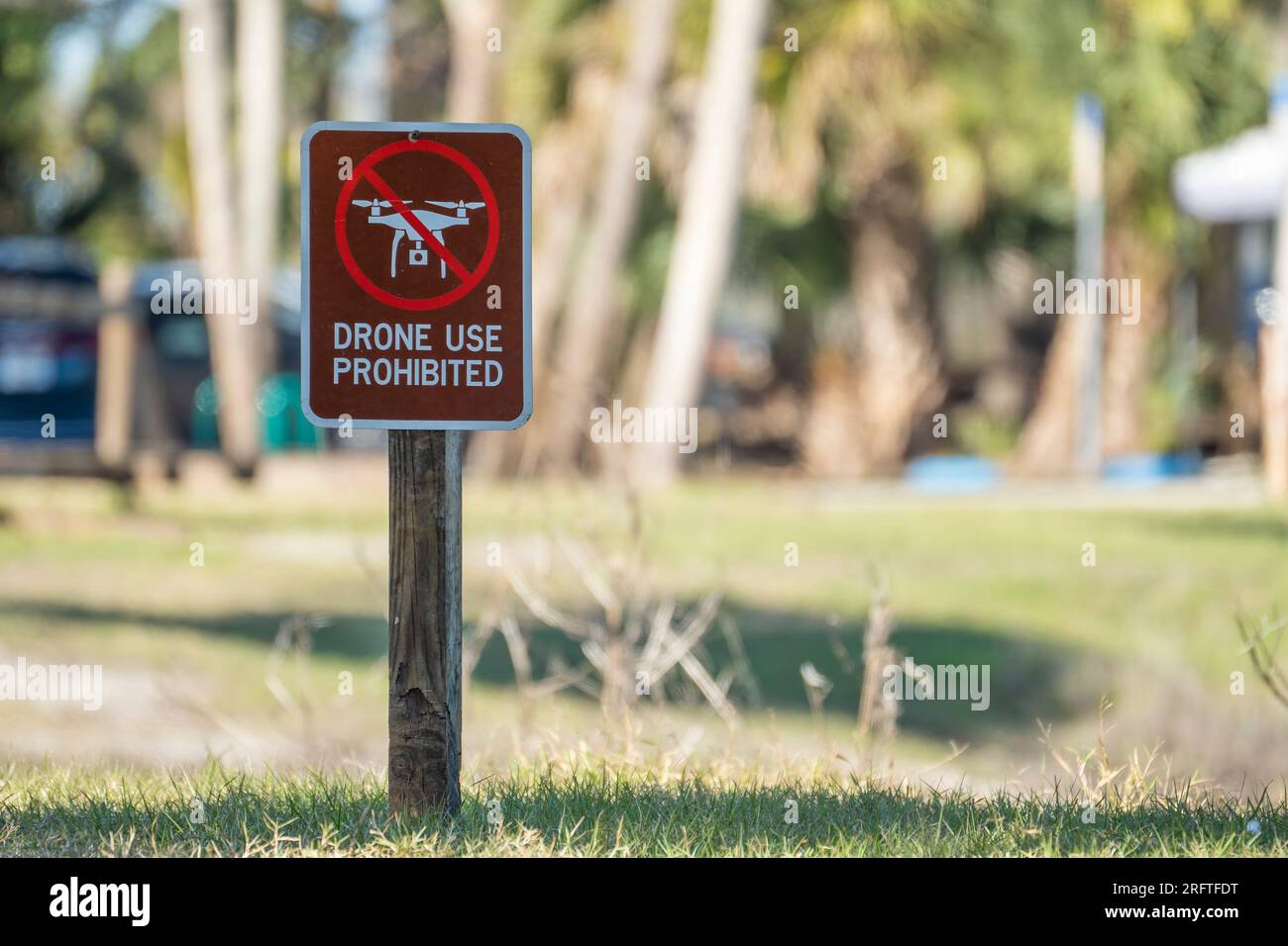 Signpost with warning about drone usage prohibition in state park ...