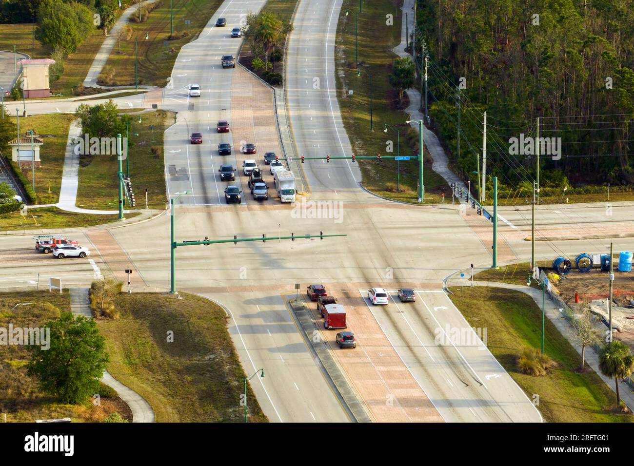 View from above of wide multilane road with driving vehicles at ...