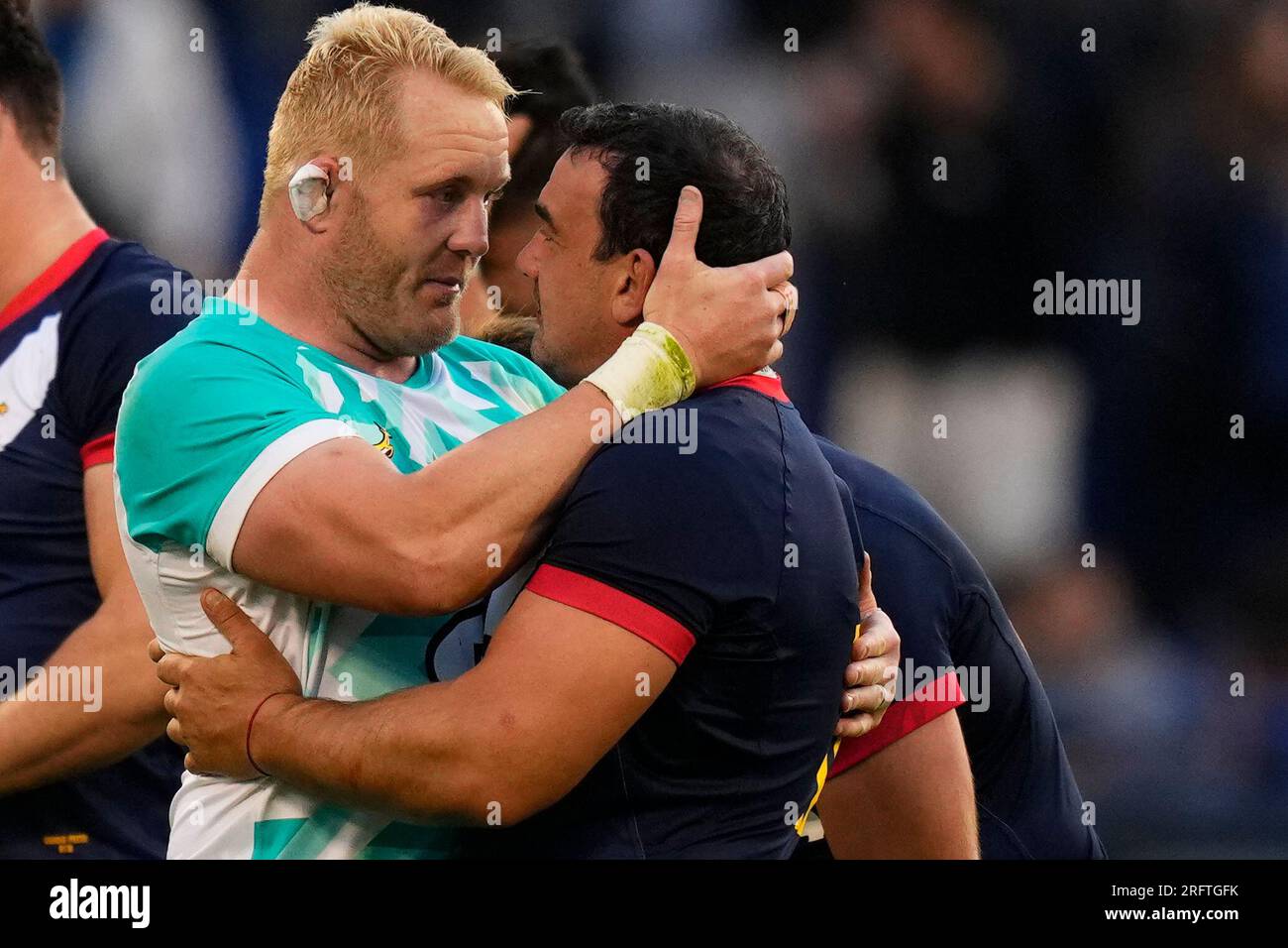 South Africa's Vincent Lock, left, embraces Argentina's Agustin Creevy ...