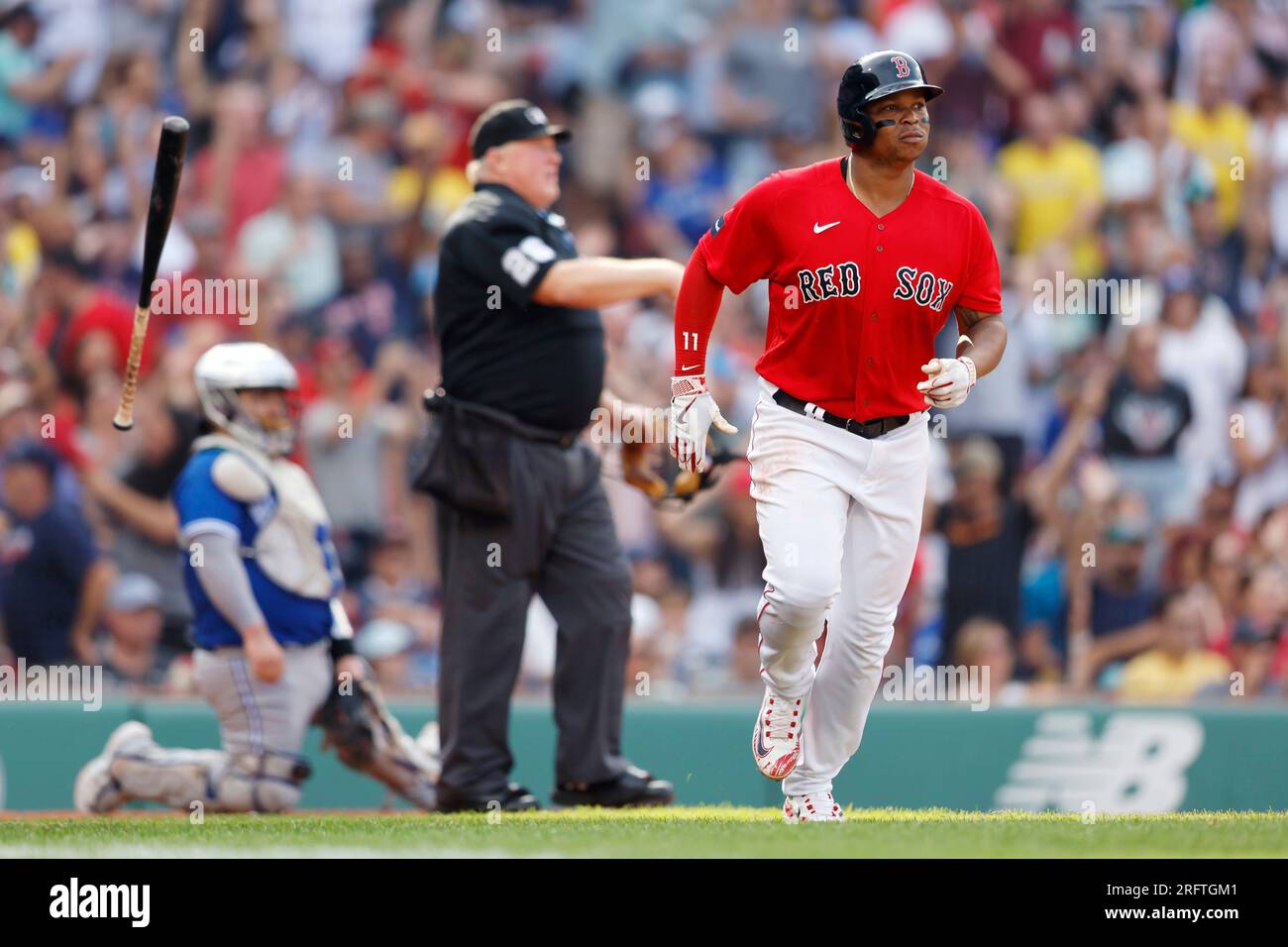 Boston Red Sox's Rafael Devers, right, runs on his three-run home run ...